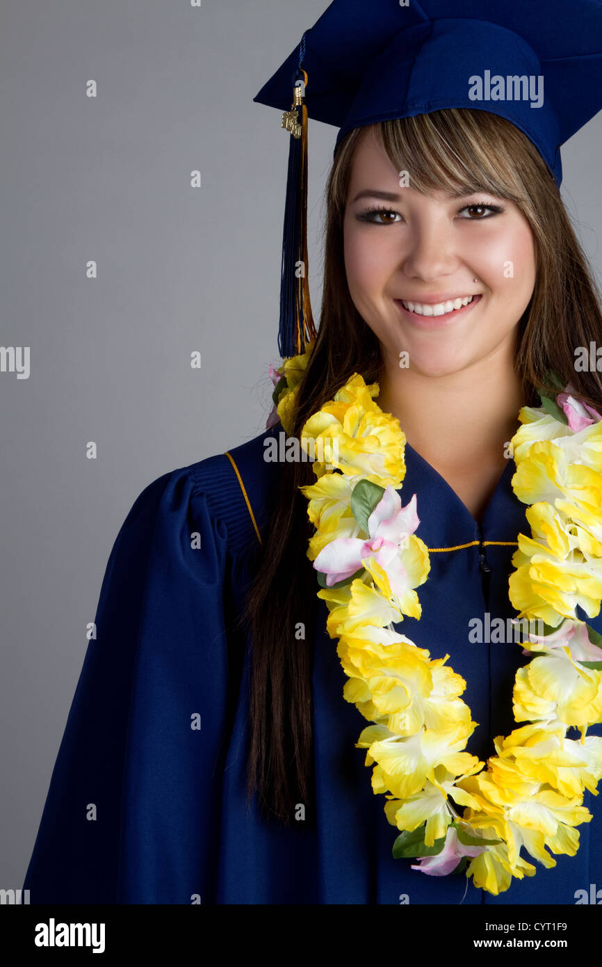 Smiling graduation girl wearing lei Stock Photo - Alamy