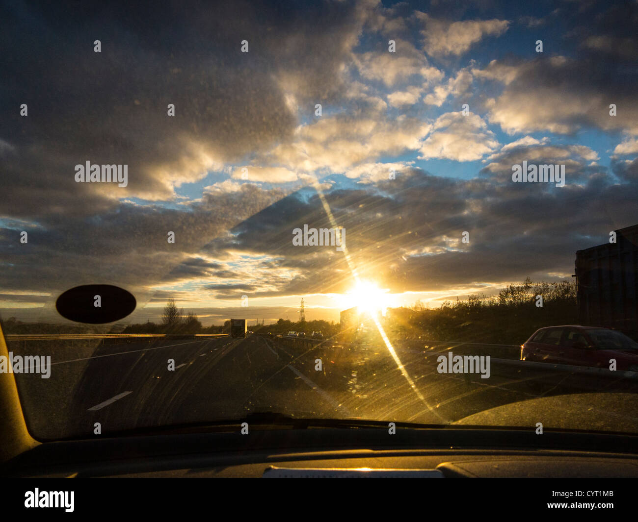 Driving on a motorway with the dangers of a low sun in Winter, M5 ...