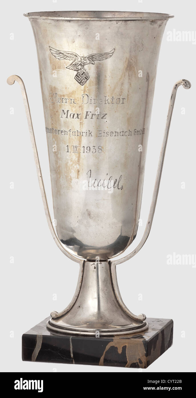 A silver goblet of honour for defense economy leaders,aircraft motor ...