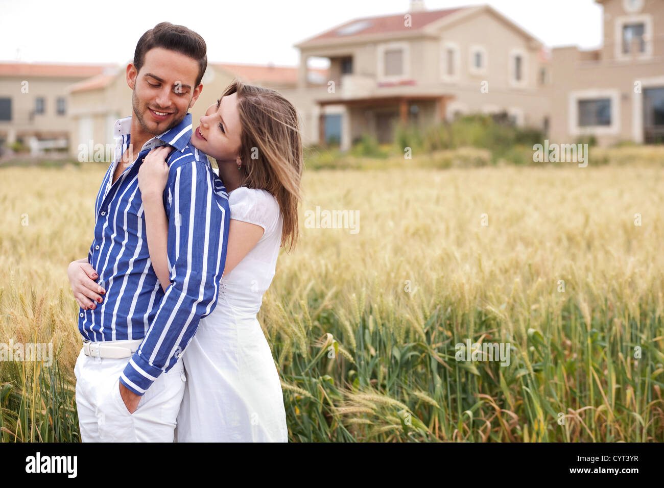 Loving couple, woman hugging her boyfriend in the park Stock Photo - Alamy