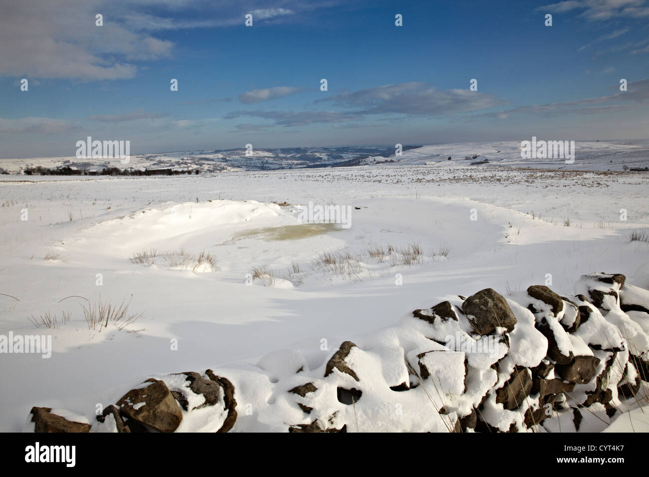Flooded and frozen Bell Pit after heavy snowfall in Nidderdale, North ...