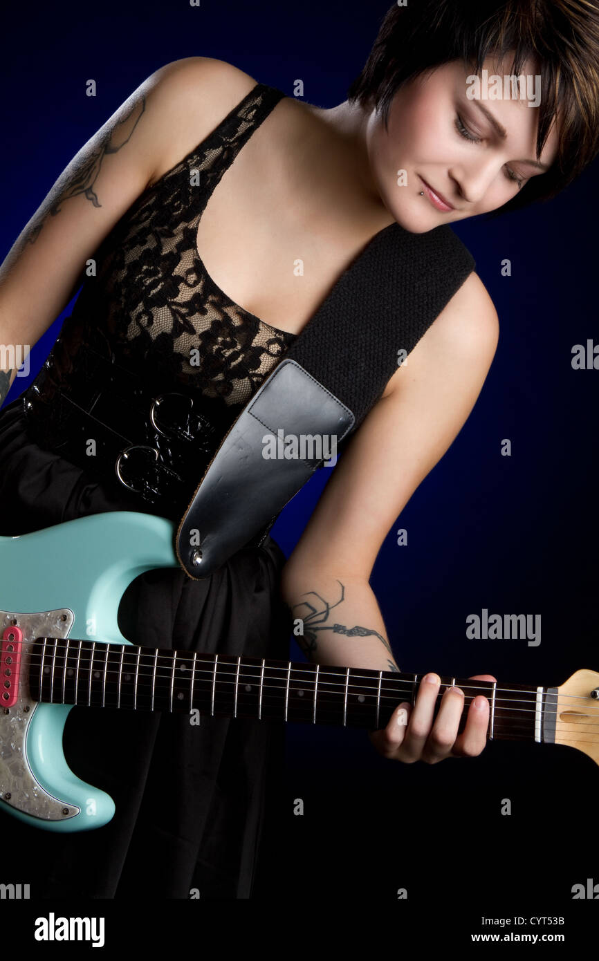 Rock star electric guitar girl Stock Photo - Alamy