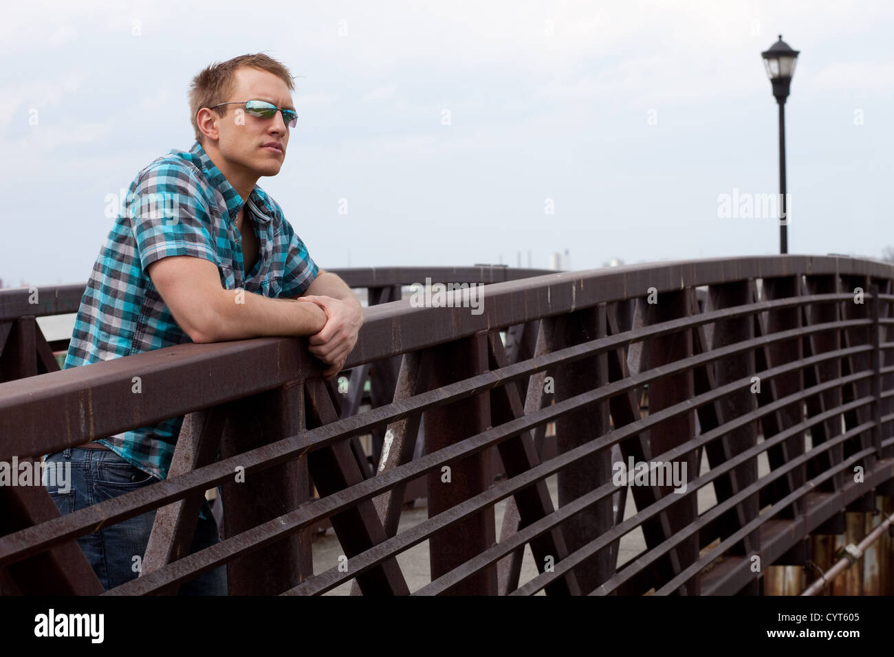 Man on Bridge Stock Photo - Alamy