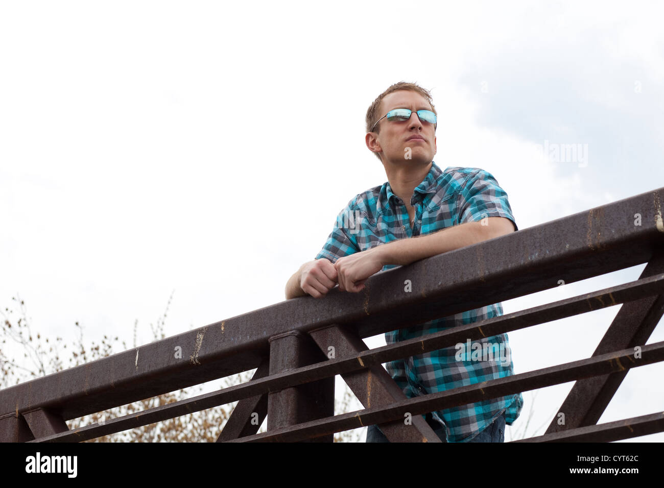 Man on Bridge Stock Photo - Alamy