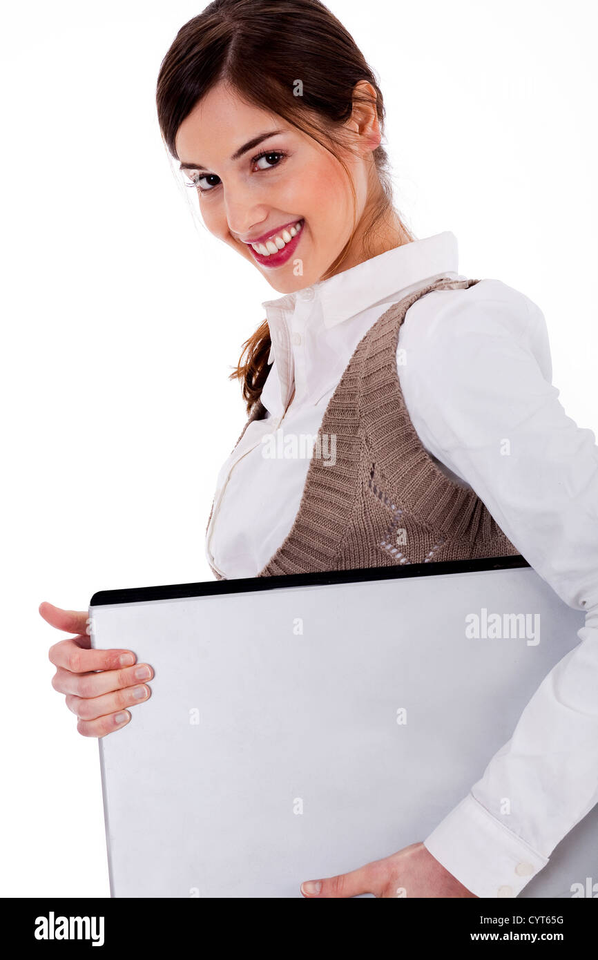 Portrait of lady holding laptop against an isolated background Stock ...