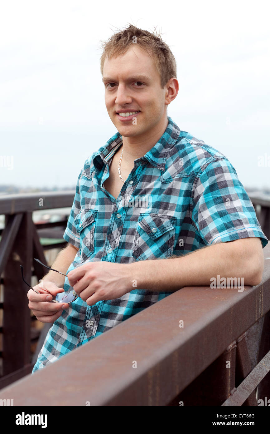 Man on Bridge Stock Photo - Alamy