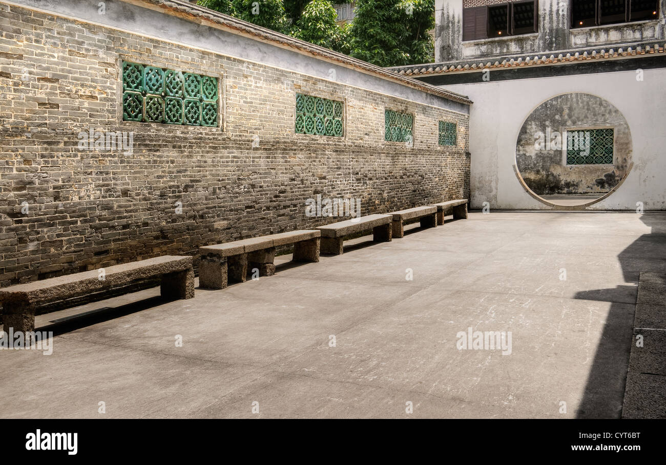 Chinese traditional corridor with stone bench, wall and ground Stock ...