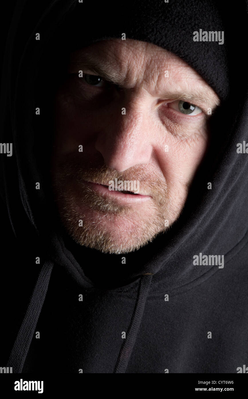 Man hat on dark hi-res stock photography and images - Alamy