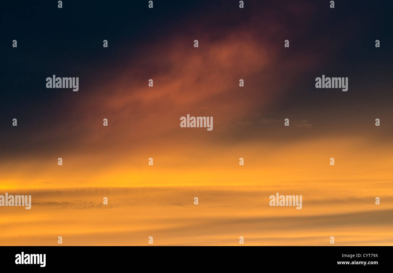 Clouds on sunset sky Stock Photo - Alamy