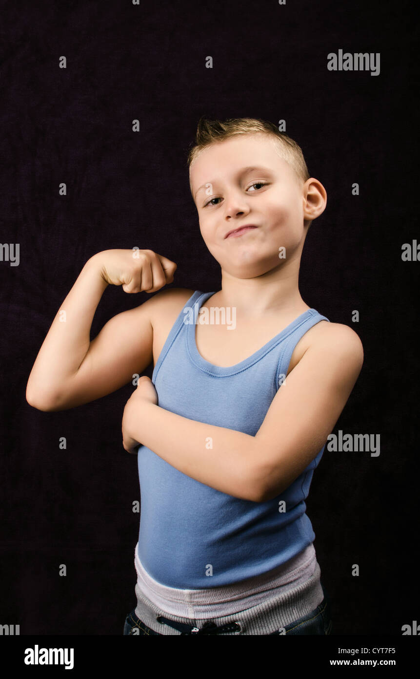 Boys showing muscles High Resolution Stock Photography and Images - Alamy