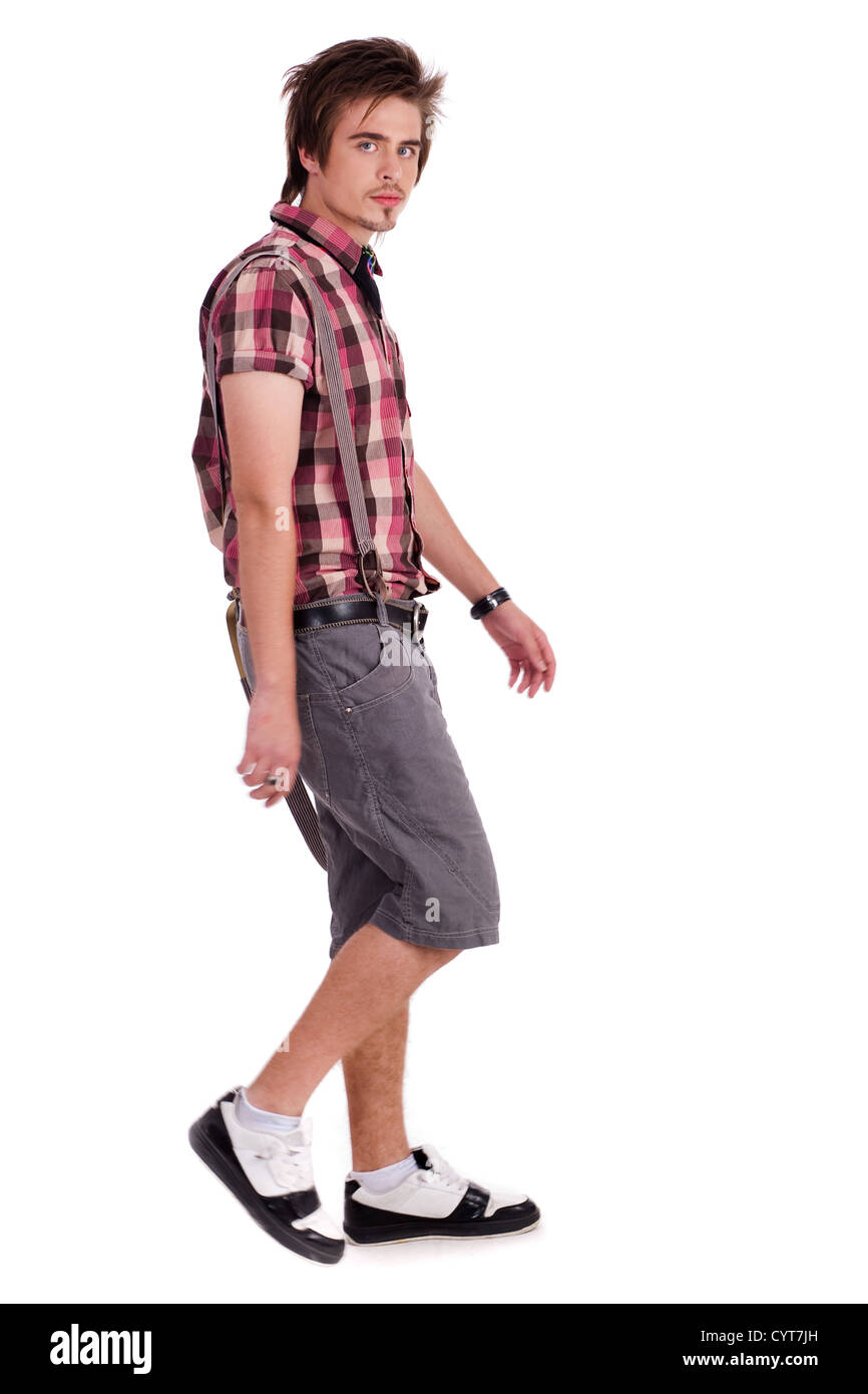 Casual handsome young guy in walking posture isolated on white ...