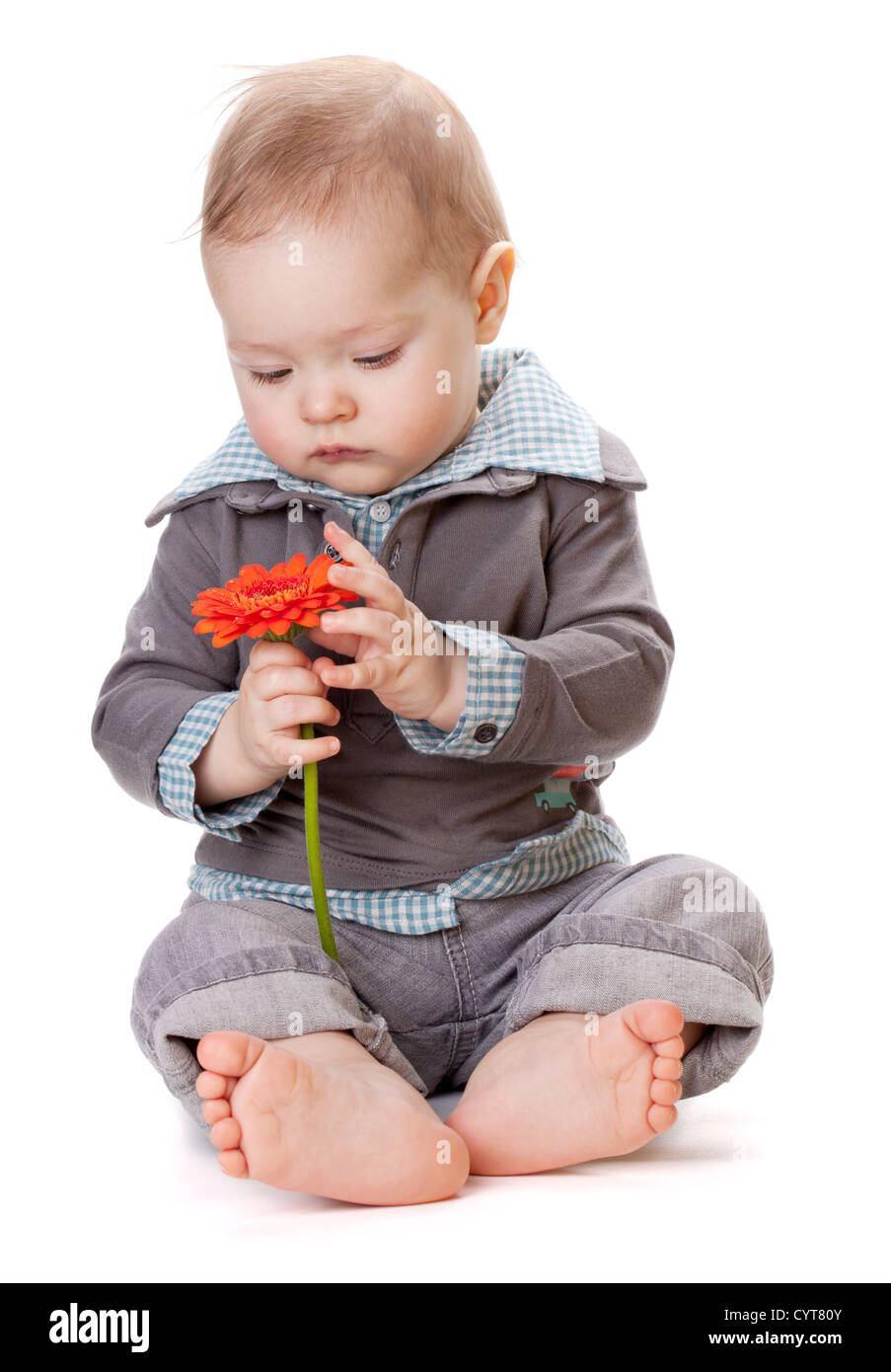 Small baby with orange flower. Isolated on white Stock Photo - Alamy