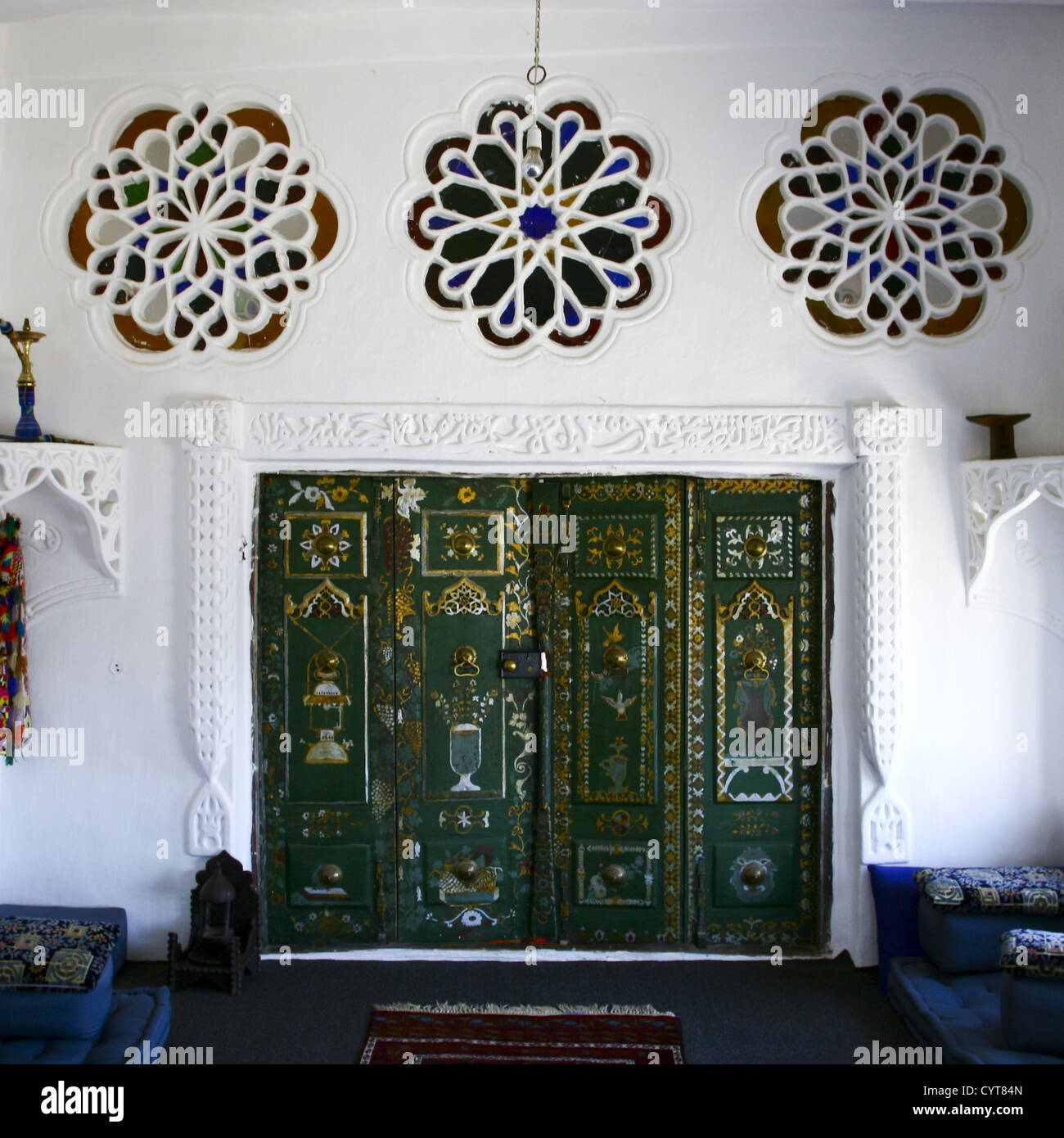 Rose Windows With Stained Glass And Artistically Painted Door Inside An ...