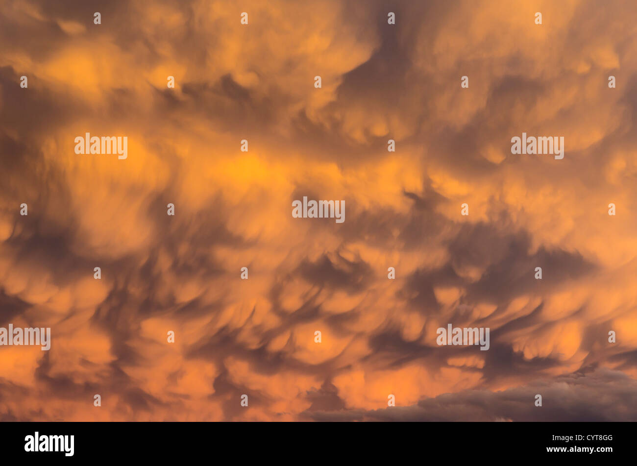 Clouds on sunset sky Stock Photo - Alamy