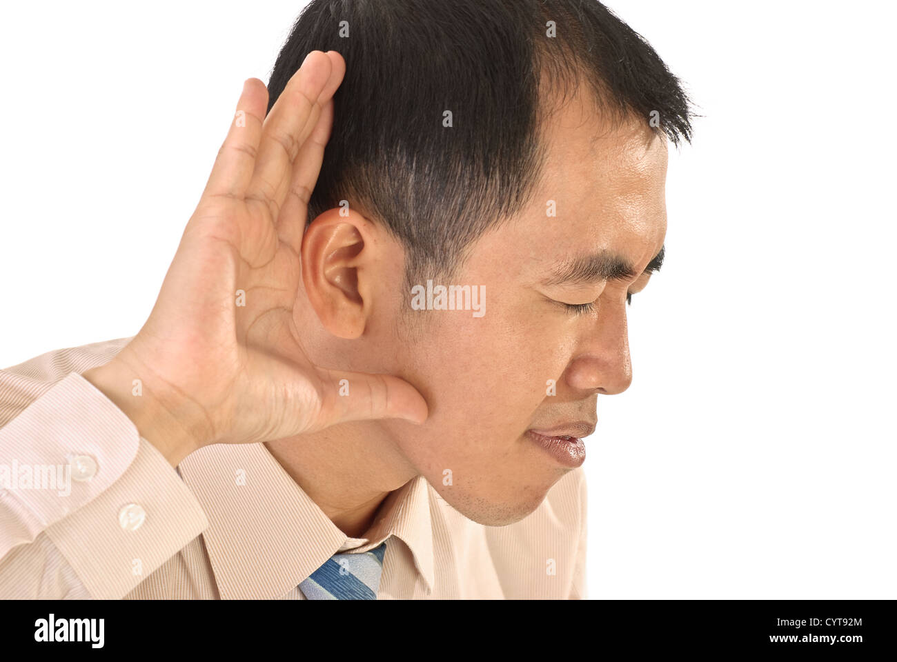 Listen sign with hand on ear, closeup portrait of Asian business man ...