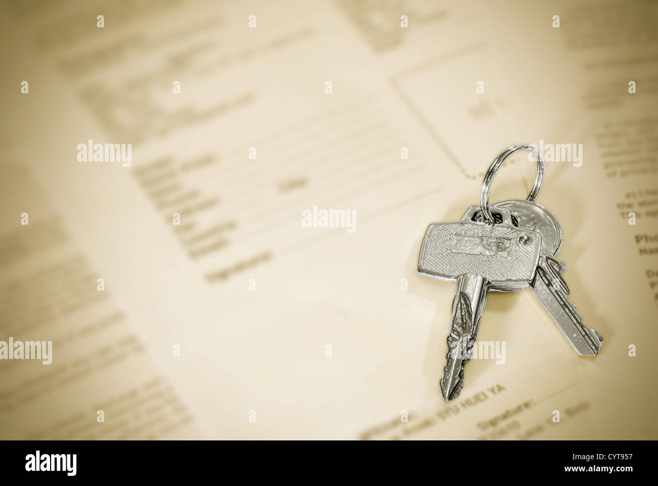 Yellow key in lock hi-res stock photography and images - Alamy