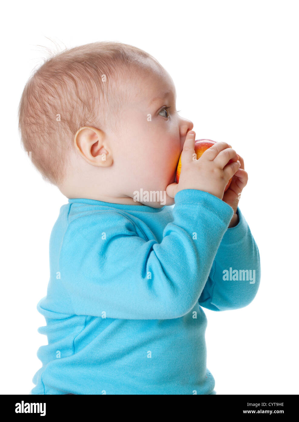 Small baby eating red apple. Isolated on white Stock Photo - Alamy