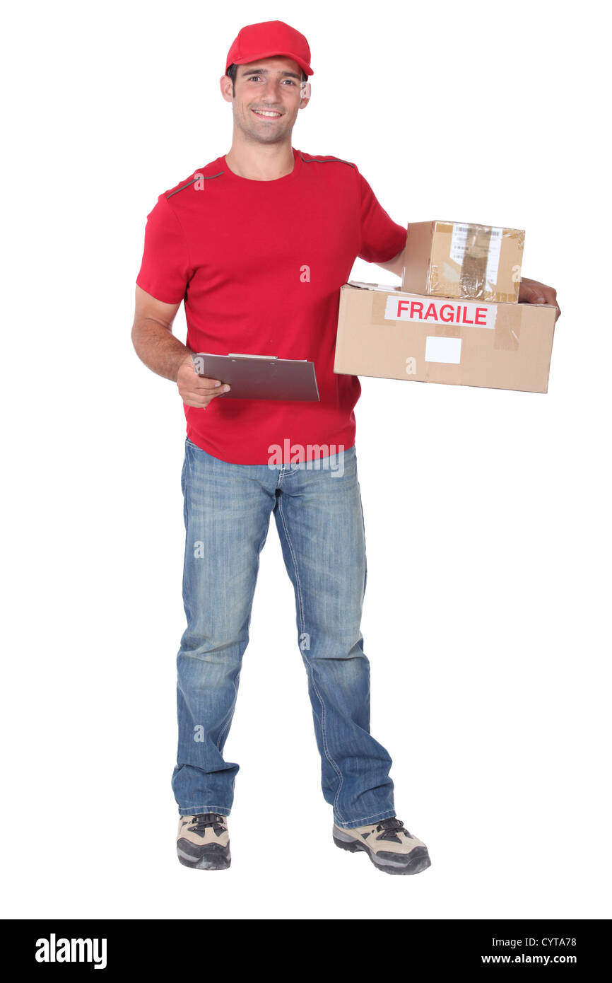 Delivery driver holding parcel Cut Out Stock Images & Pictures - Alamy