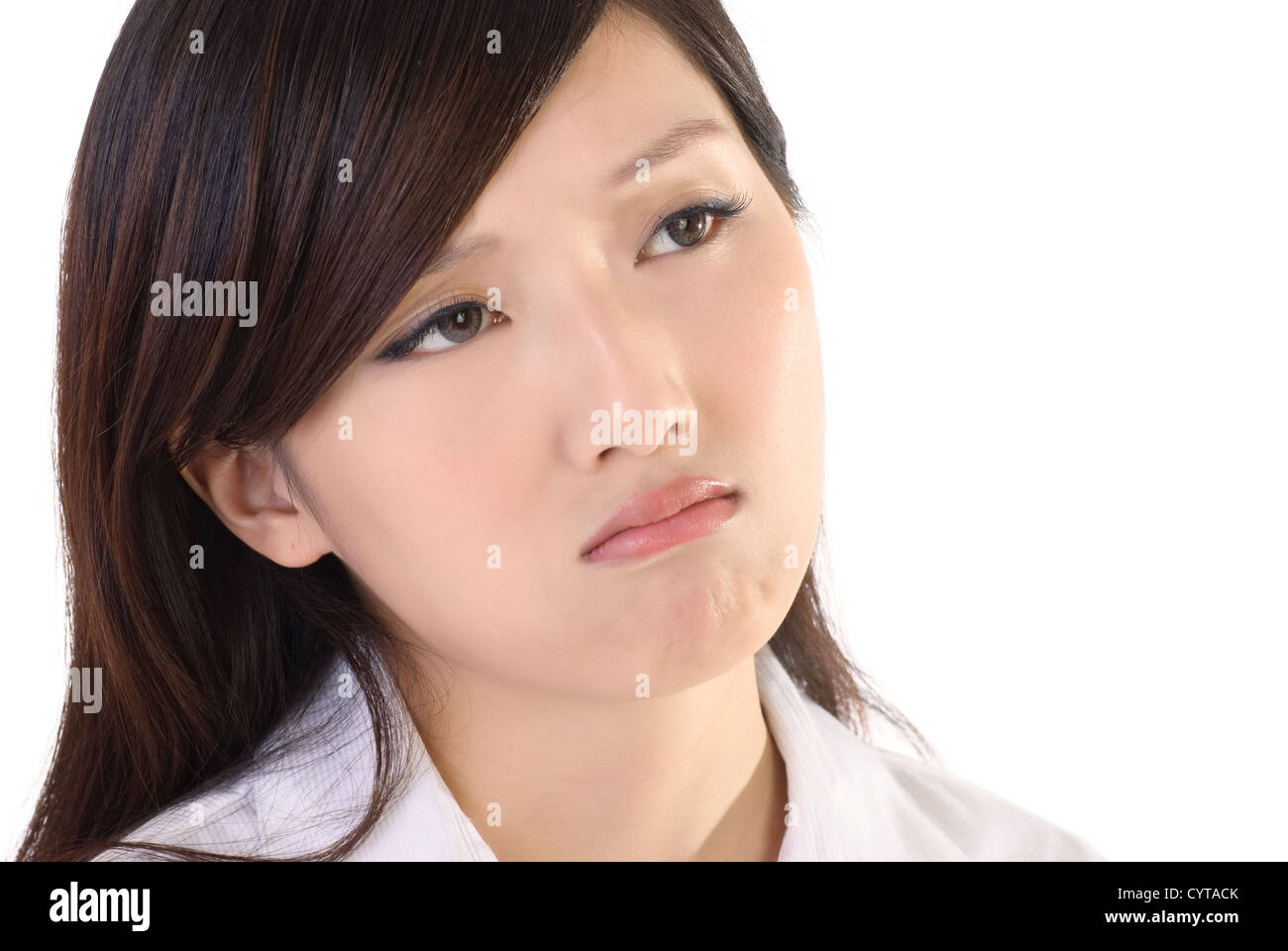 Boring expression on face of Asian businesswoman Stock Photo - Alamy