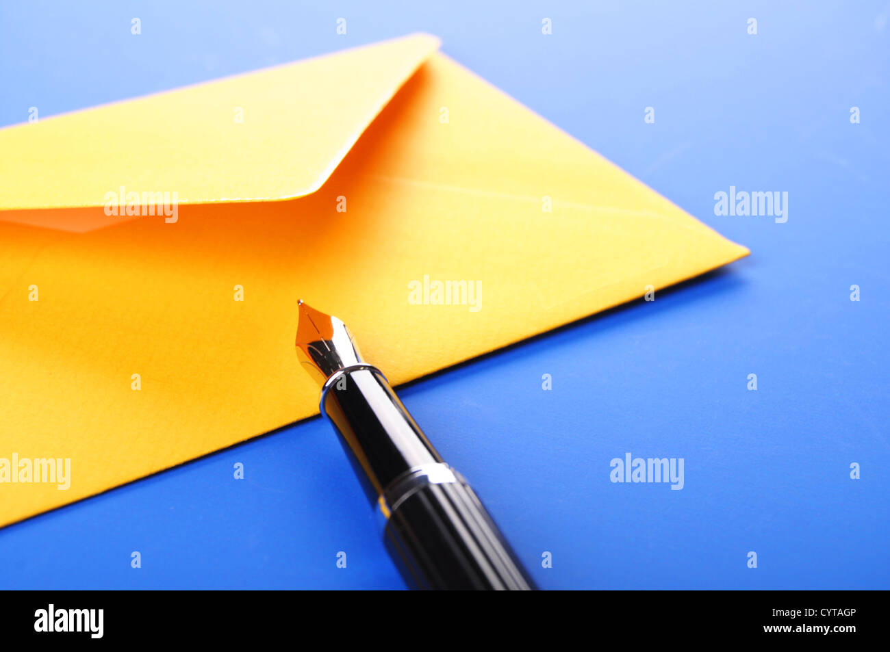 envelop and pen showing mail or communication concept Stock Photo - Alamy