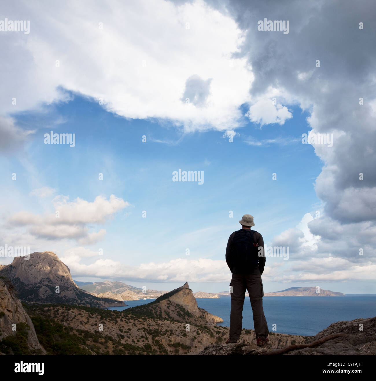 man on the cliff Stock Photo - Alamy