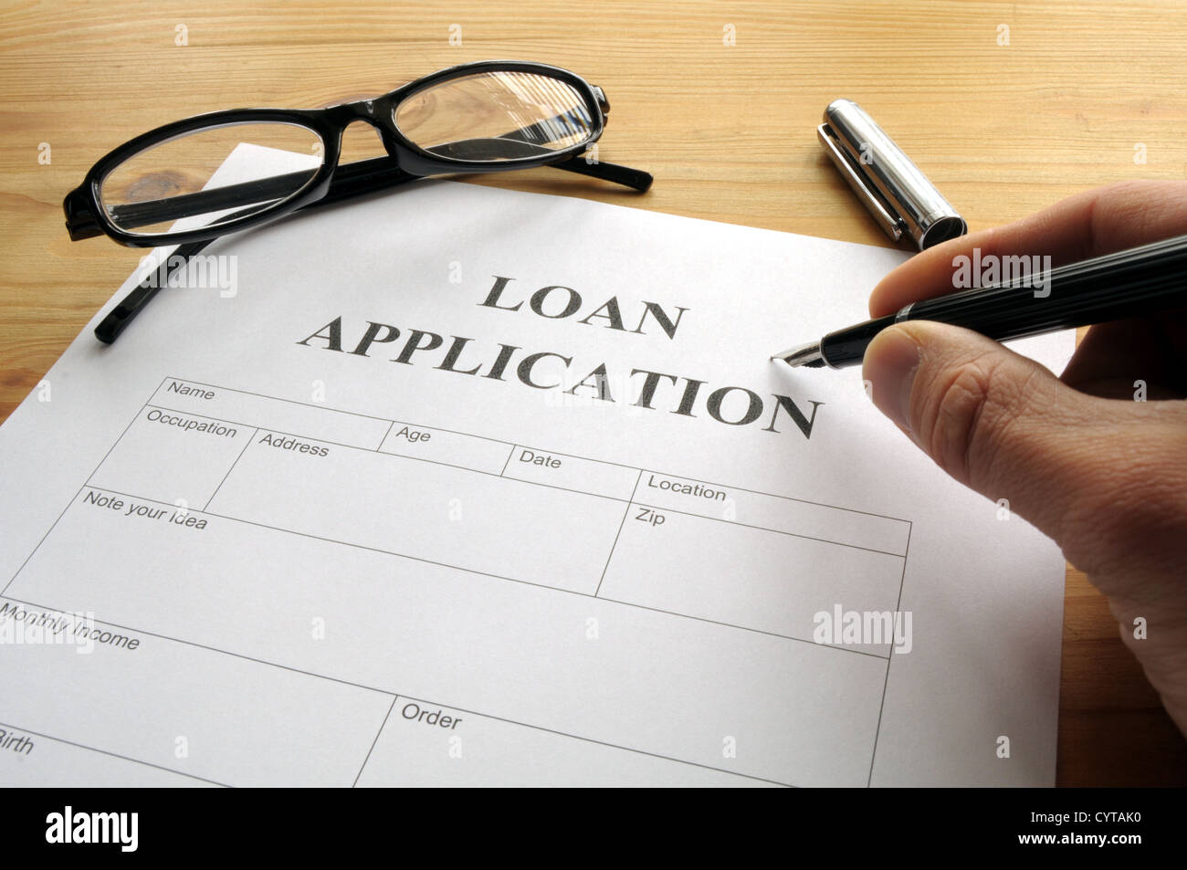 loan application form or document in bank office showing finance ...