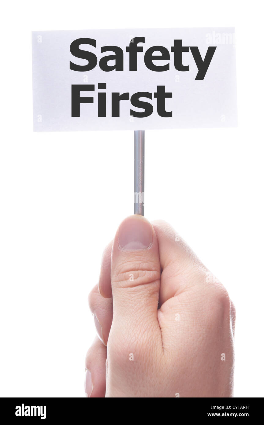 safety first concept with hand word and paper Stock Photo - Alamy