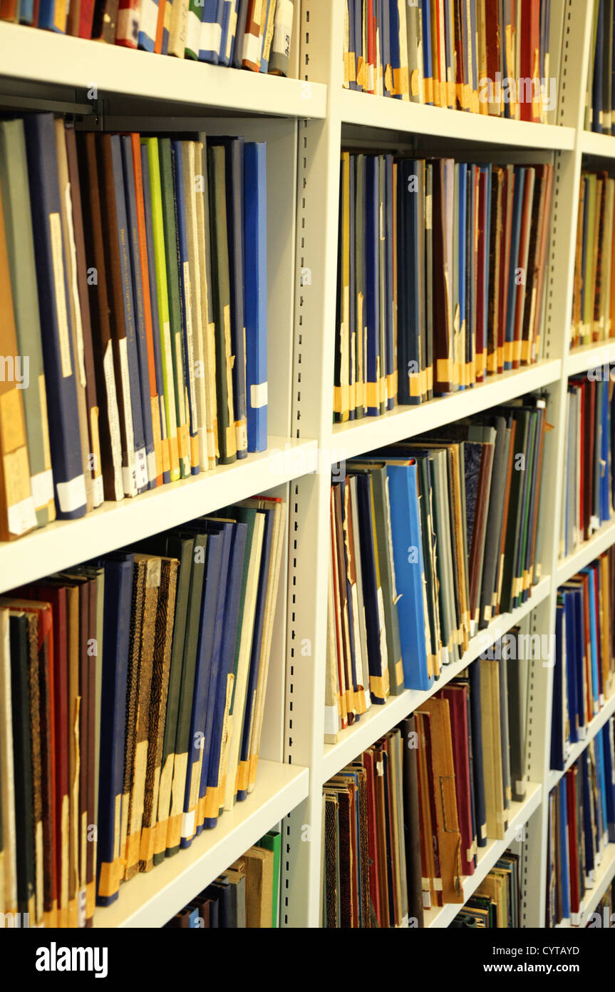 education books in a library showing school or university concept Stock ...