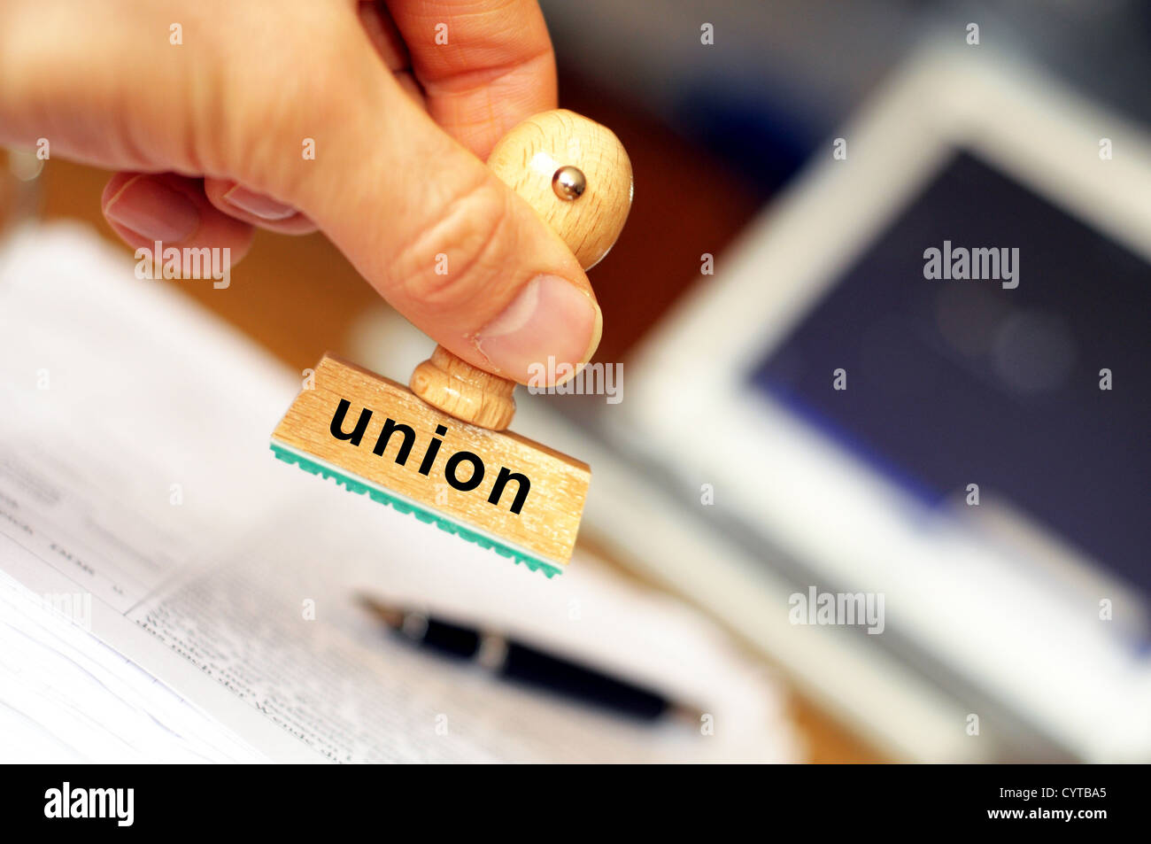 union concept with stamp and documents in the office Stock Photo - Alamy