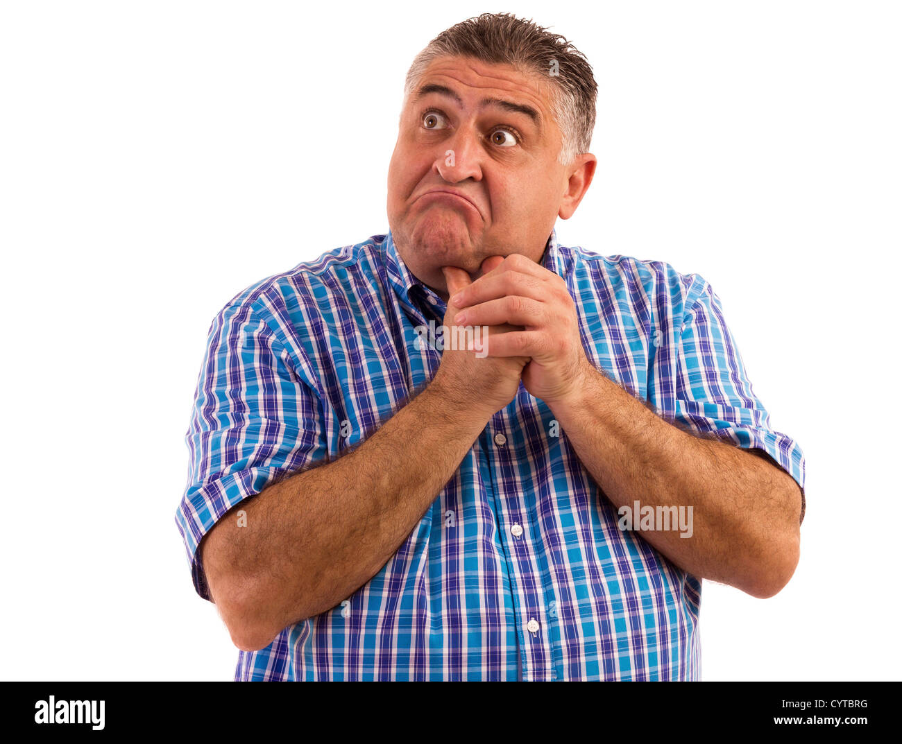 Man thinking hard about a problem holding his hands at chin Stock Photo ...