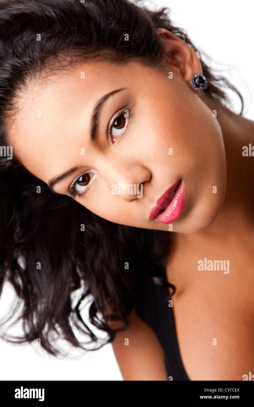 Face of a beautiful Hispanic woman with clear skin and natural makeup ...