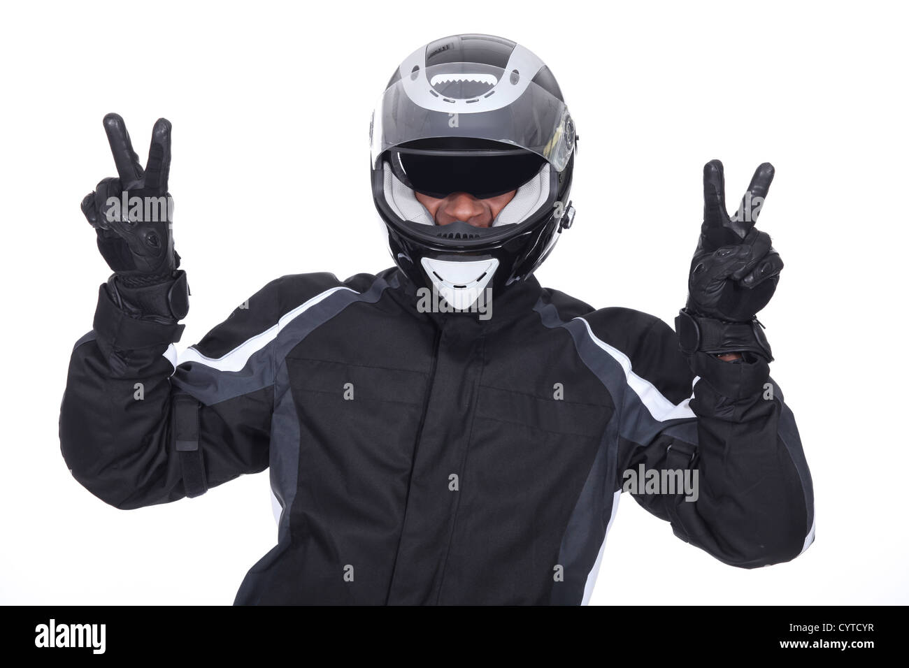 biker doing victory sign Stock Photo - Alamy