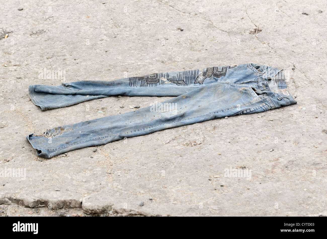 jeans shore ruined pants clothes beach Stock Photo - Alamy