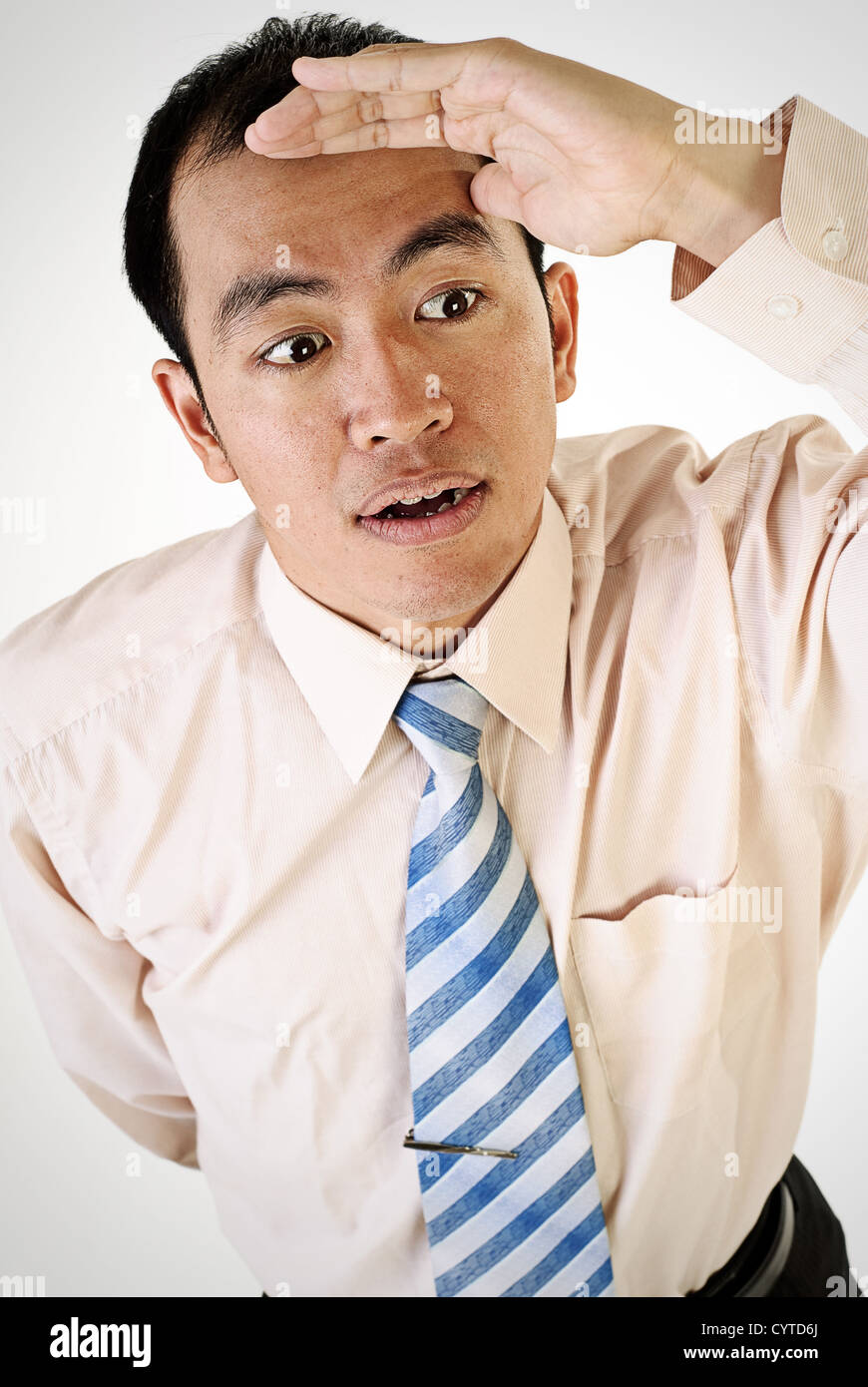 Asian business man look and open eyes Stock Photo - Alamy