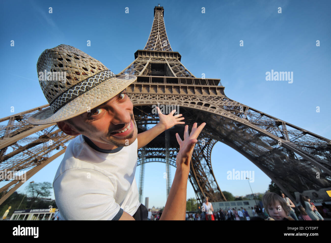 Happy smiling tourist pointing to Eiffel Tower in Paris, France Stock ...