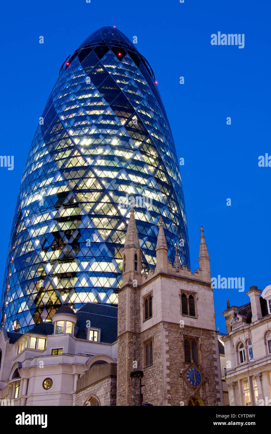 Swiss Re Building 30 St Mary Axe also known as the Gherkin at night ... Swiss Re Building 30 St Mary Axe also known as the Gherkin at night ...