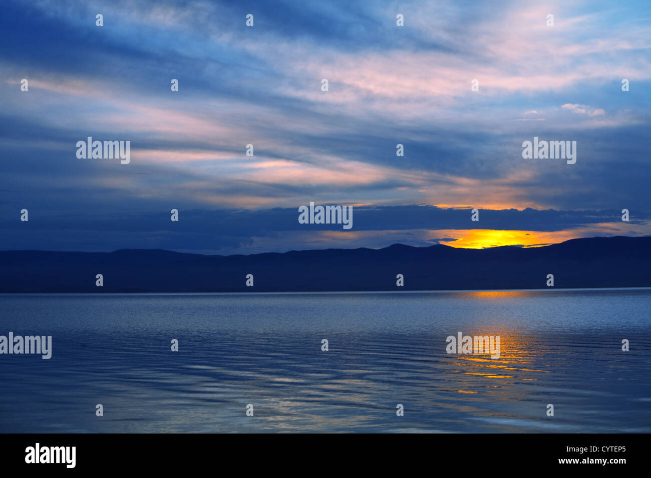 Sunrise scene on lake Stock Photo - Alamy