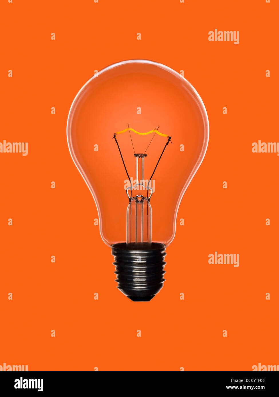 Bulb light on orange Stock Photo - Alamy