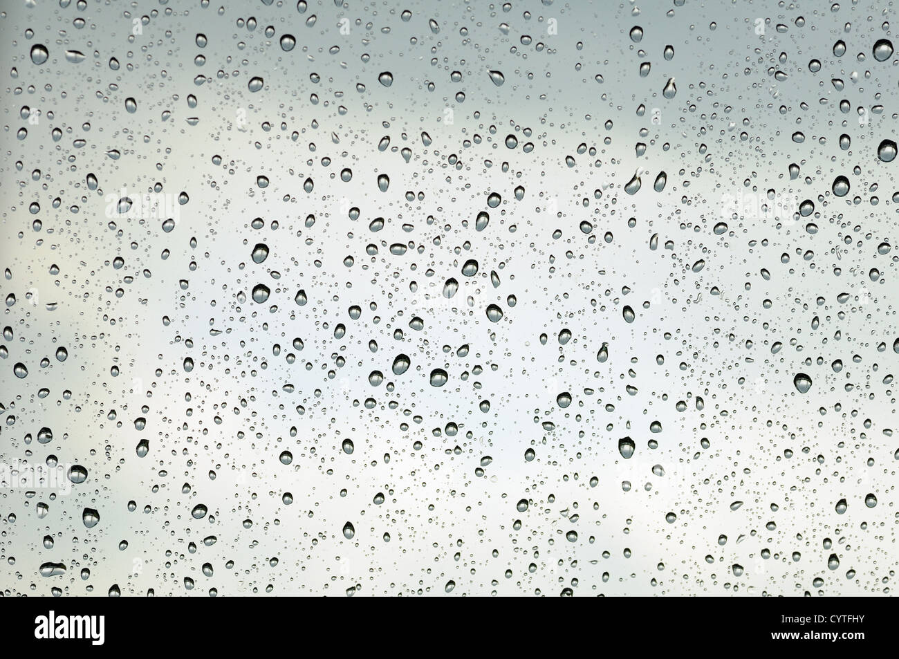 Rain drops on a windowpane Stock Photo - Alamy