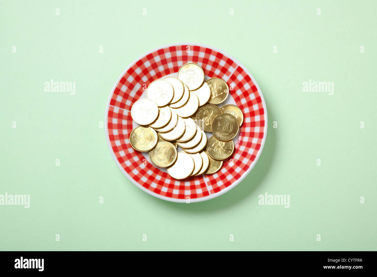 money on plate Stock Photo - Alamy