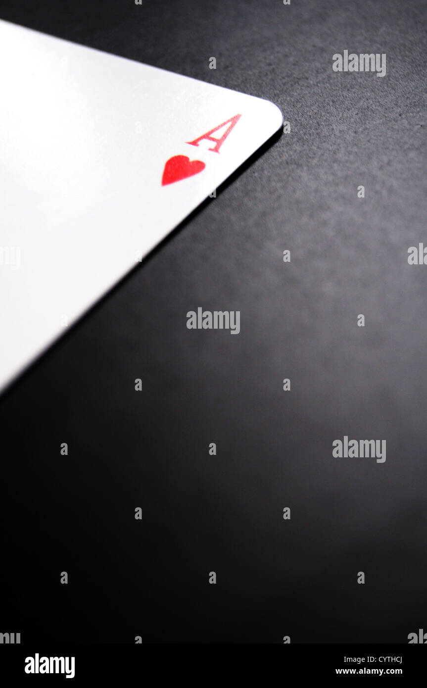 card game with aces on black background Stock Photo - Alamy