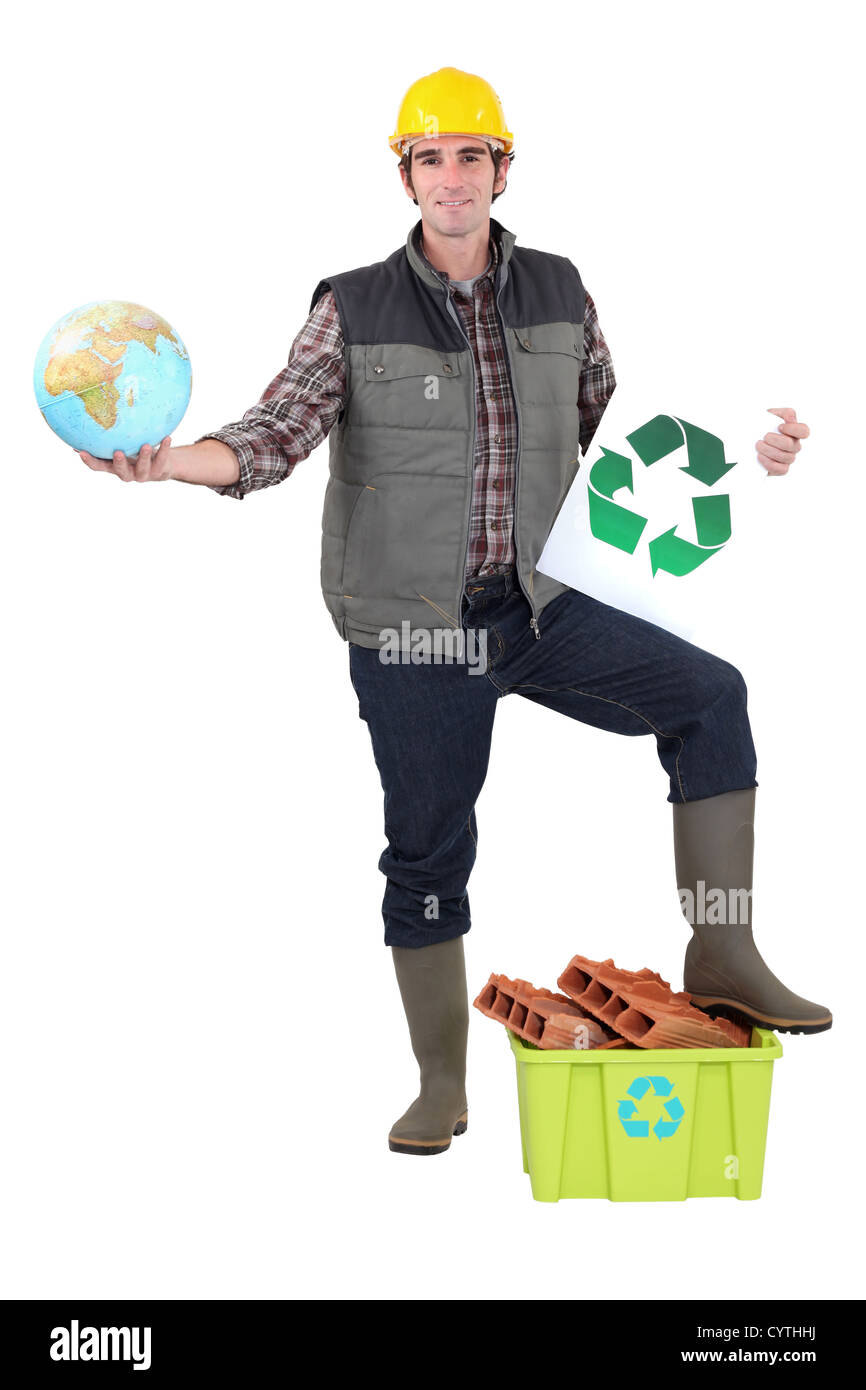Man in yellow vest holding hi-res stock photography and images - Alamy