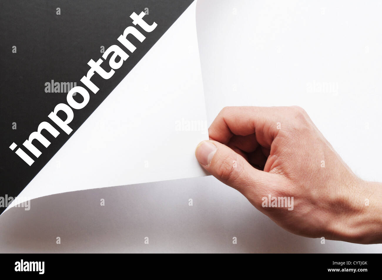 important news concept with hand holding paper Stock Photo - Alamy