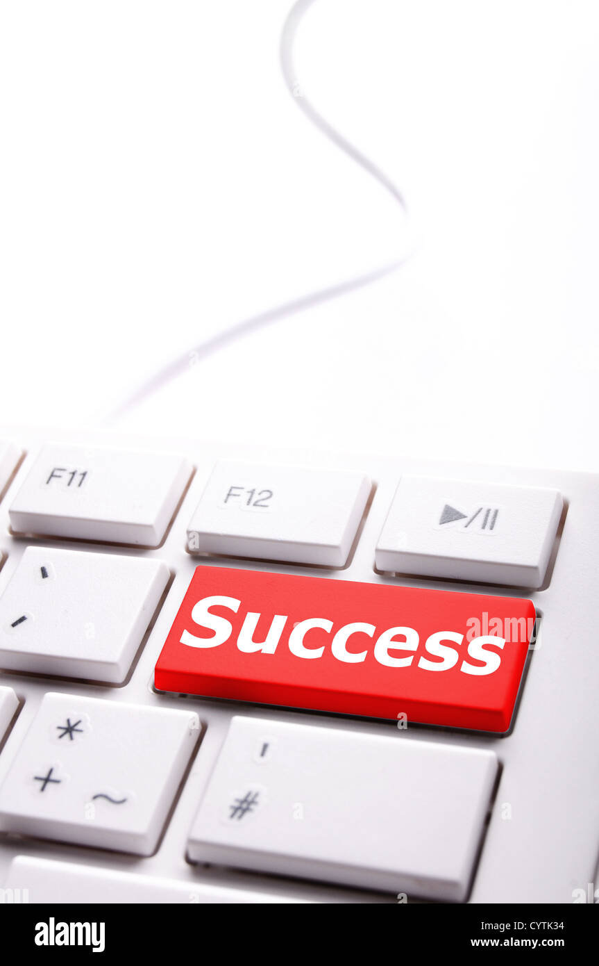 success in business concept with key on computer keyboard Stock Photo ...