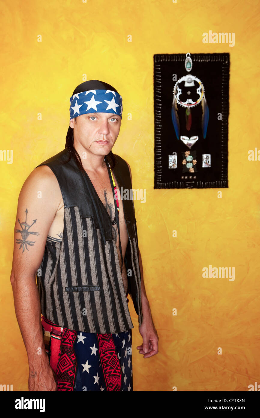 Handsome Native American man with his personal artwork Stock Photo - Alamy