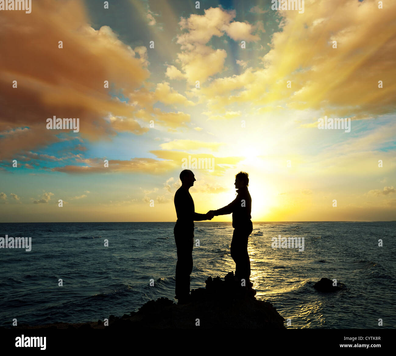 Couple on sunset Stock Photo - Alamy