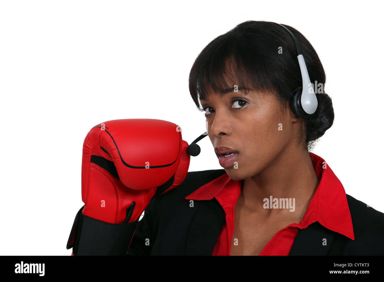 Call center worker with boxing gloves Stock Photo - Alamy