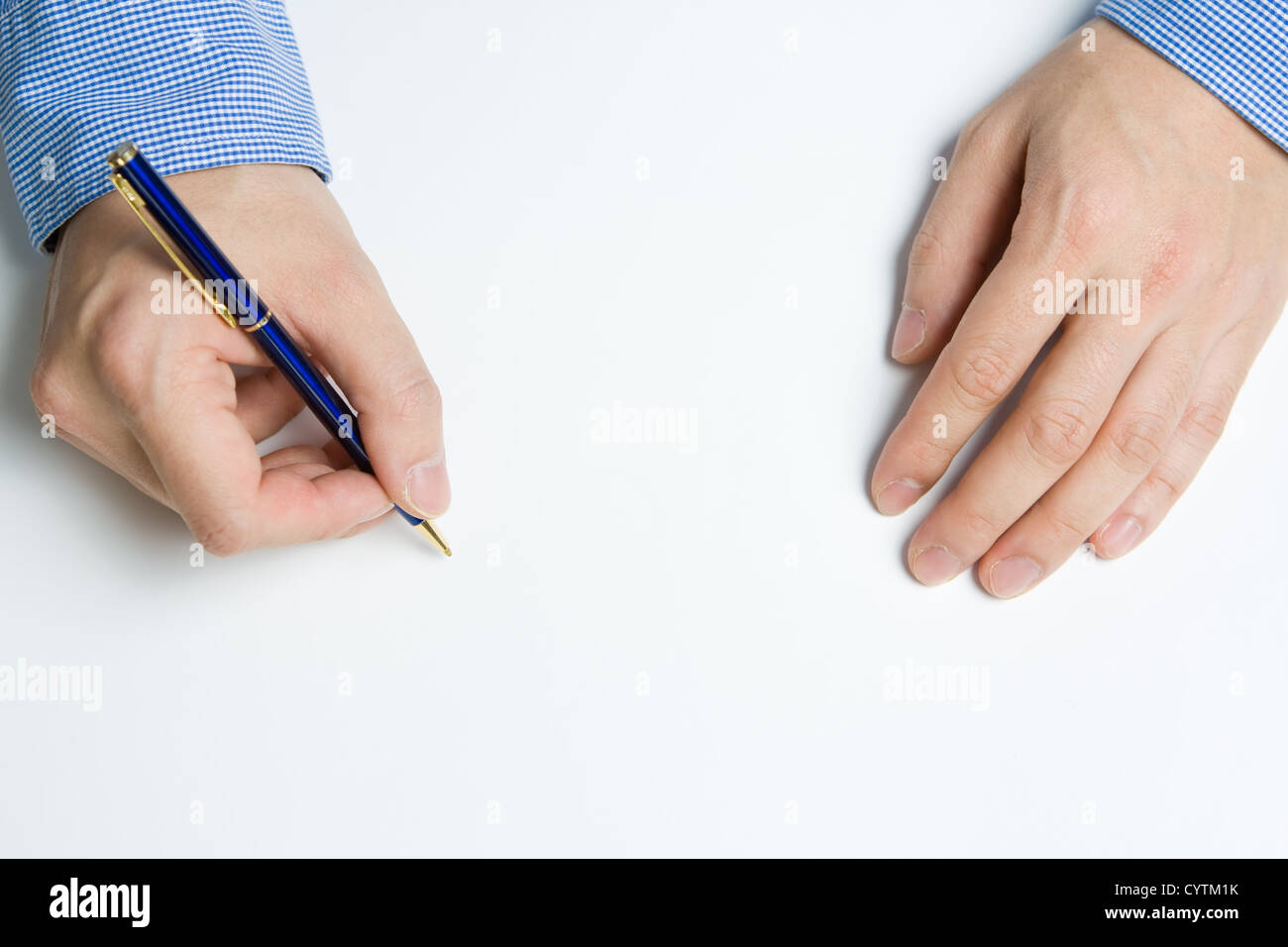 Person writing a message on a piece of paper or note Stock Photo - Alamy