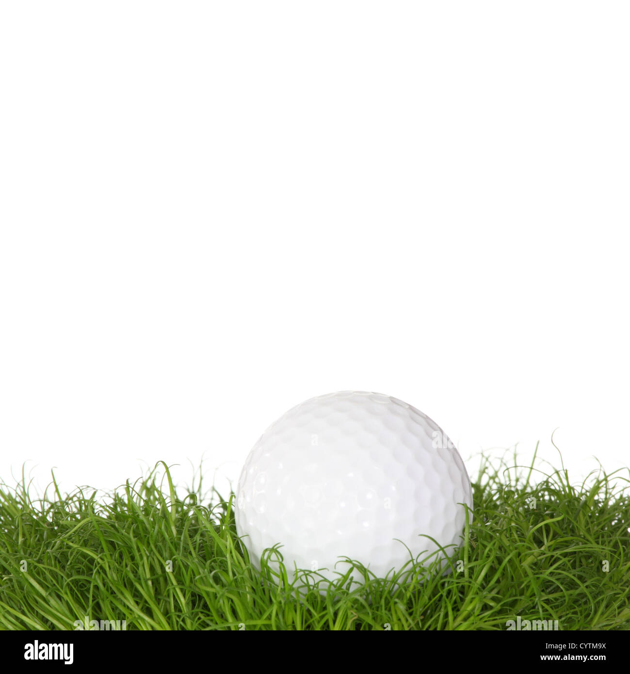 A golf ball in the grass isolated on white background Stock Photo - Alamy