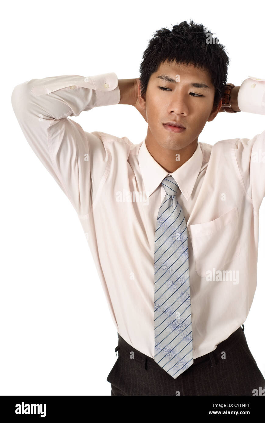 Young businessman put hands on head, closeup portrait on white ...